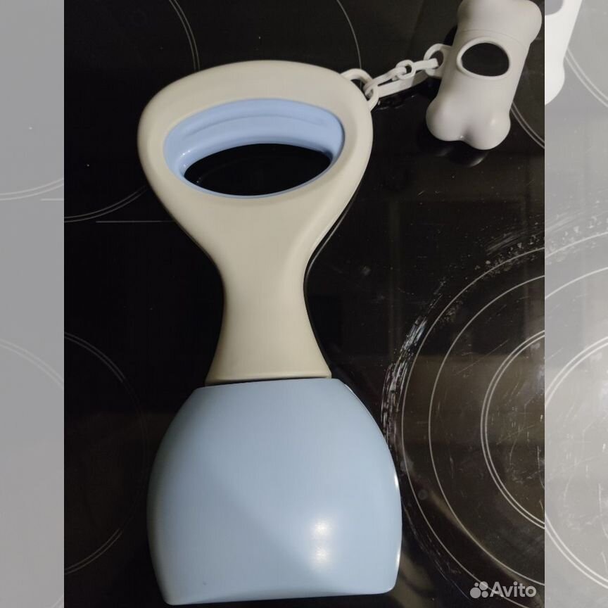 Устройство для уборки. Совок для собак