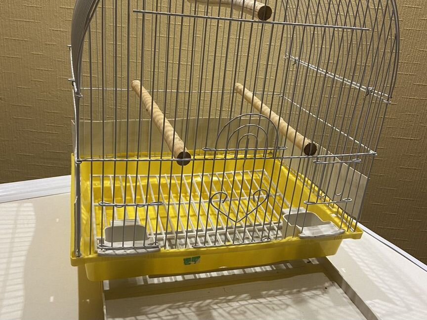 Клетка для птиц и корм